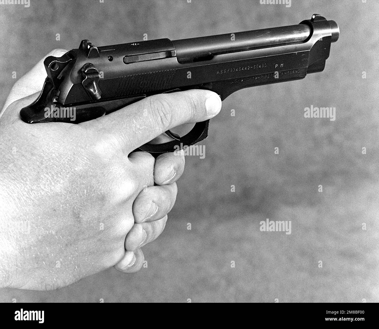 A close-up, right side view of the two-hand grip used with the M-9 9mm ...