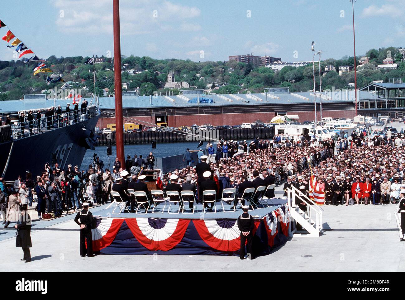 Sailors manning the rail of the destroyer USS HAYLER (DD 997) overlook ...