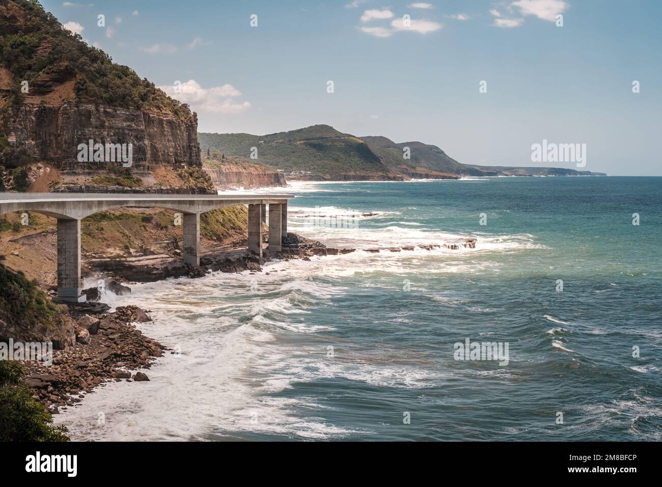 Sea Cliff Bridge, a balanced cantilever bridge built in 2005, curves ...