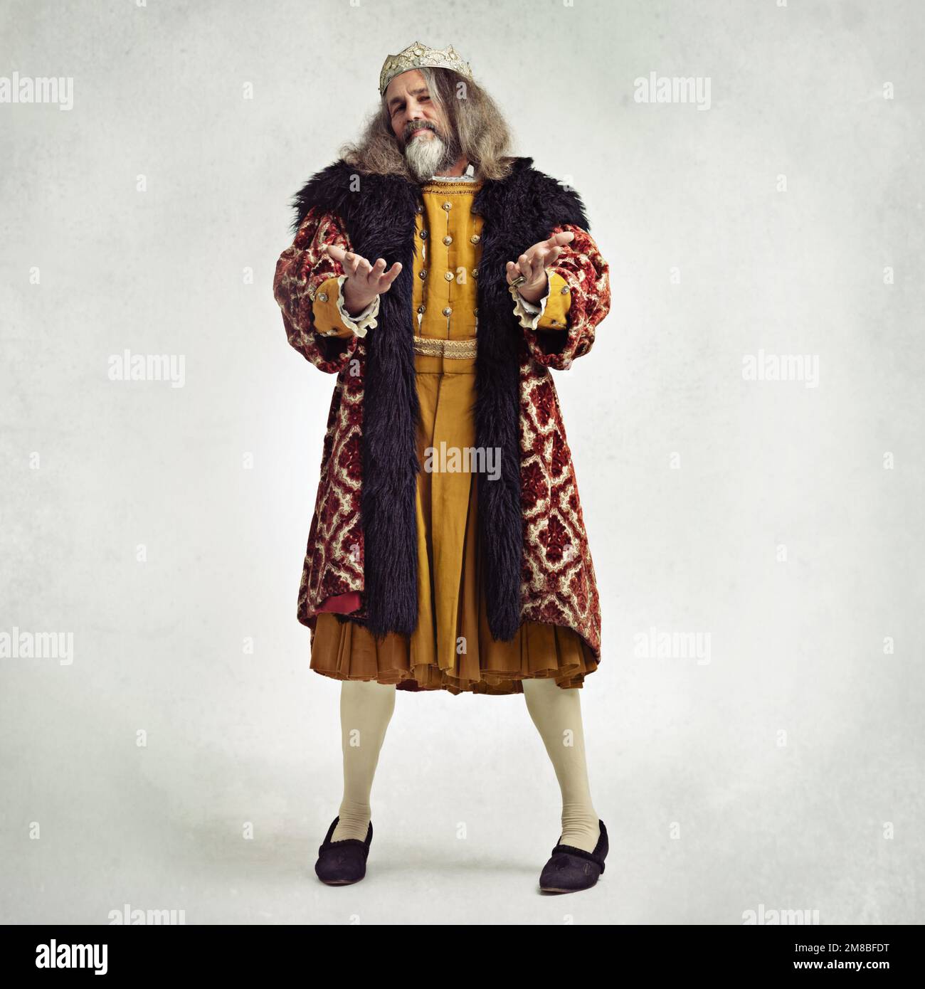 Royalty, king and portrait of man in studio isolated on a gray ...
