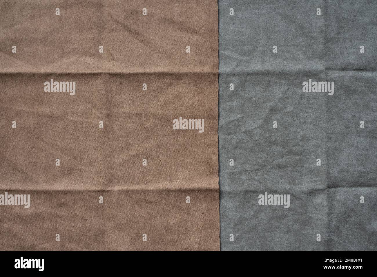 Folded brown and gray fabric texture background Stock Photo - Alamy
