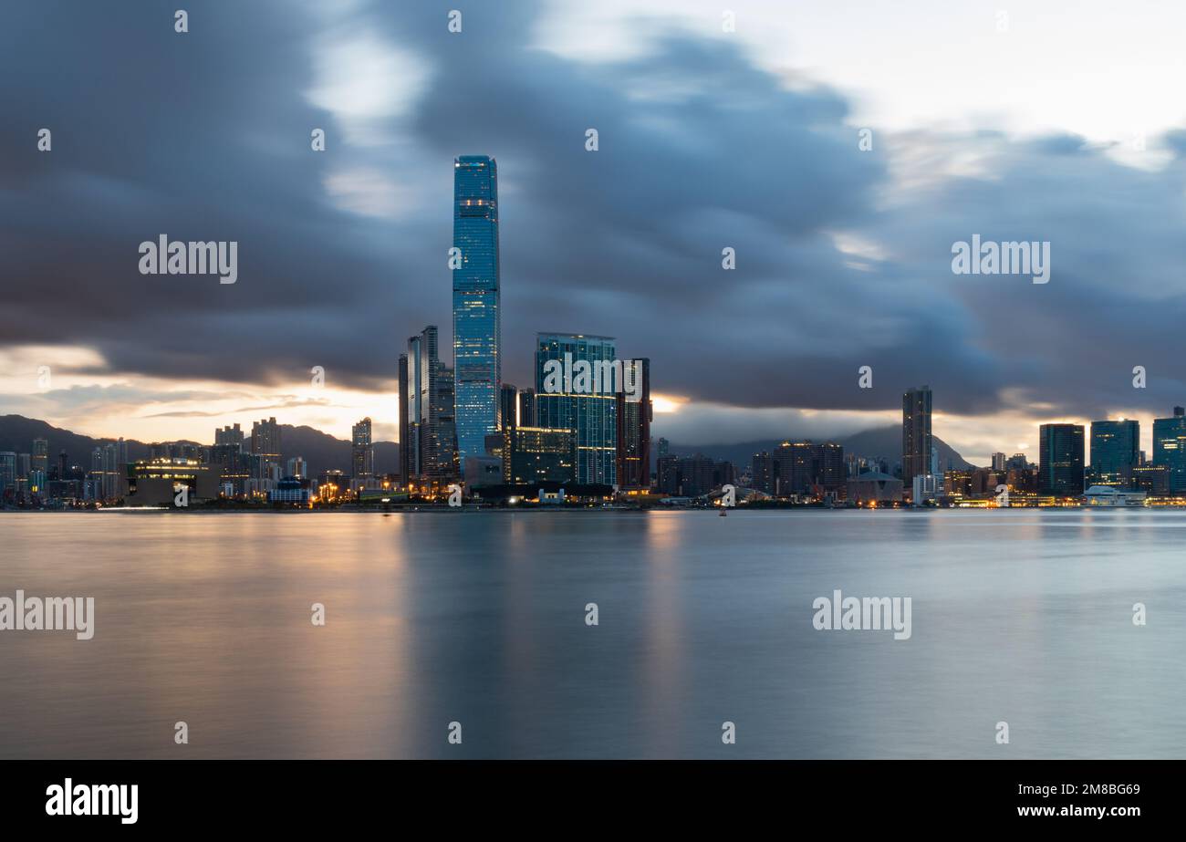 Long exposure of the early morning clouds over buildings in Kowloon ...