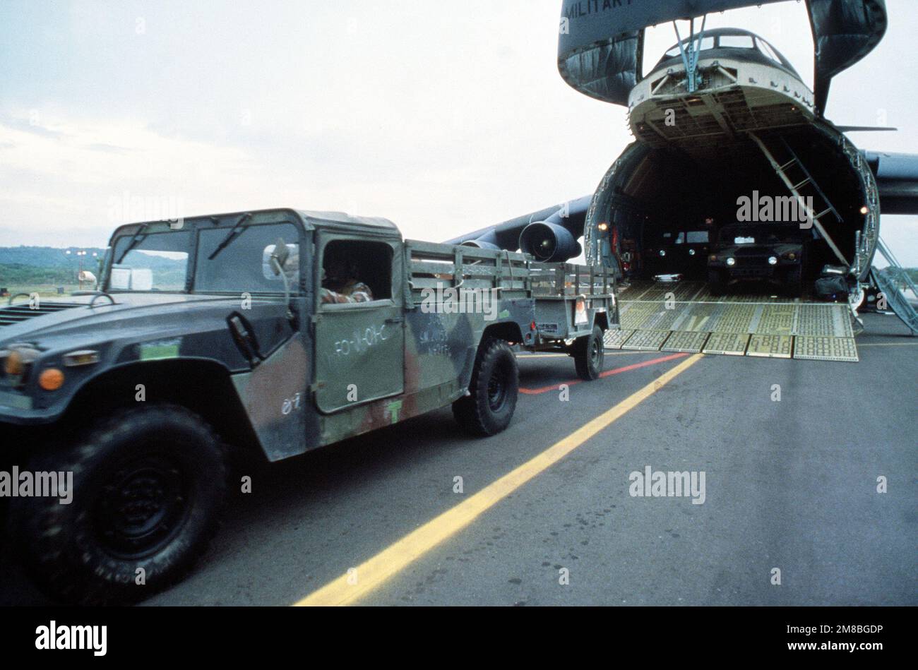 M998 High-Mobility Multipurpose Wheeled Vehicles (HMMWV)towing ...