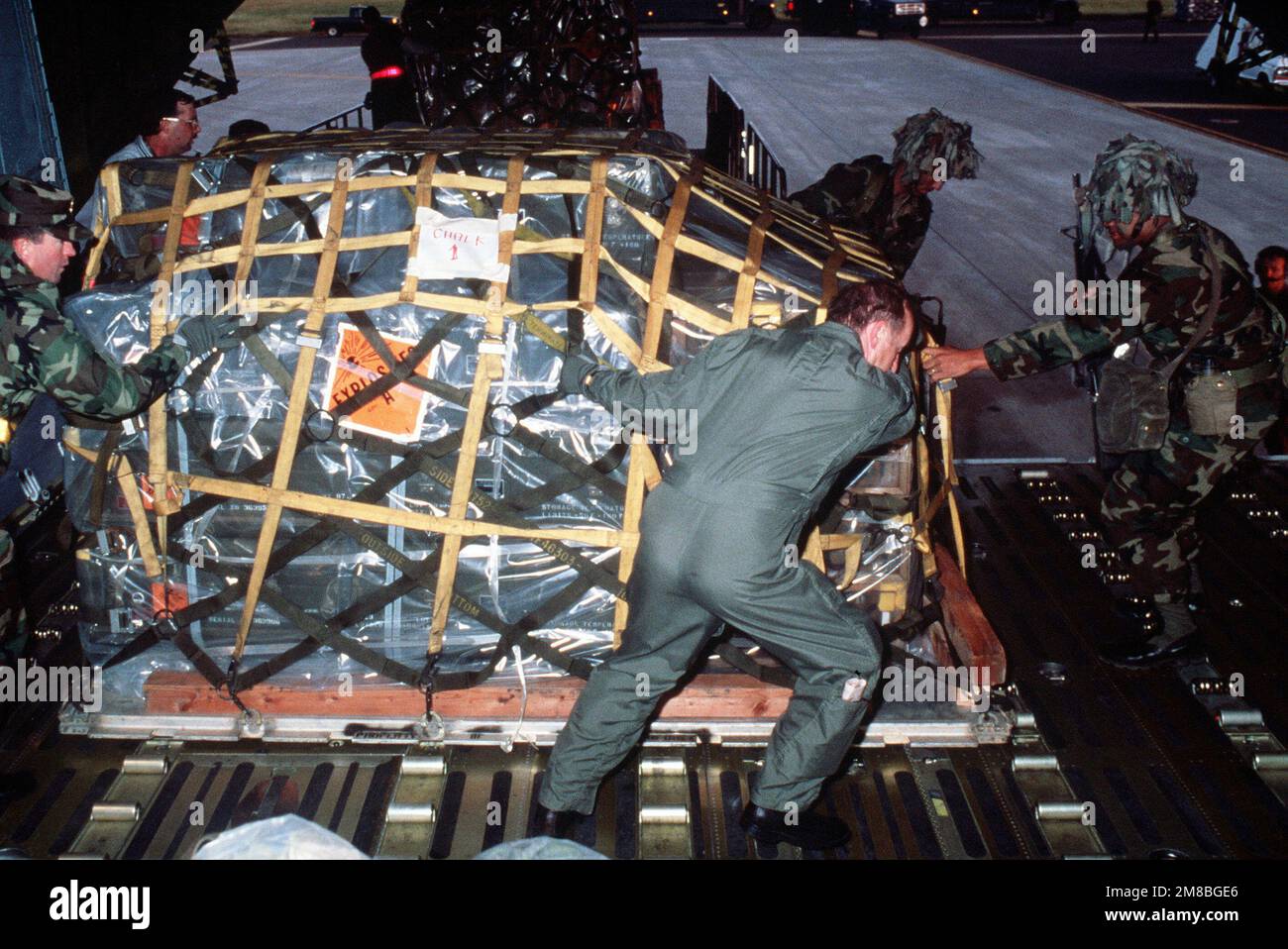 Panama bound soldiers of the 7th Light Infantry Division manhandle a ...