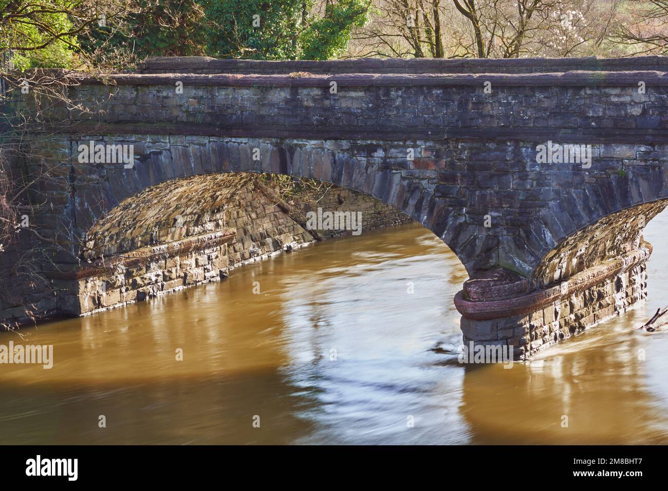 The Ynys Bridge over The River Taff full of rainwater, South Wales ...