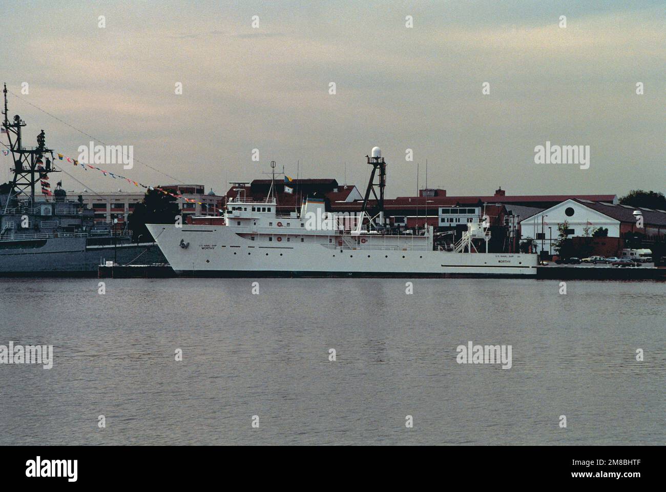 A port beam view of the ocean surveillance ship USNS WORTHY (T-AGOS-14 ...