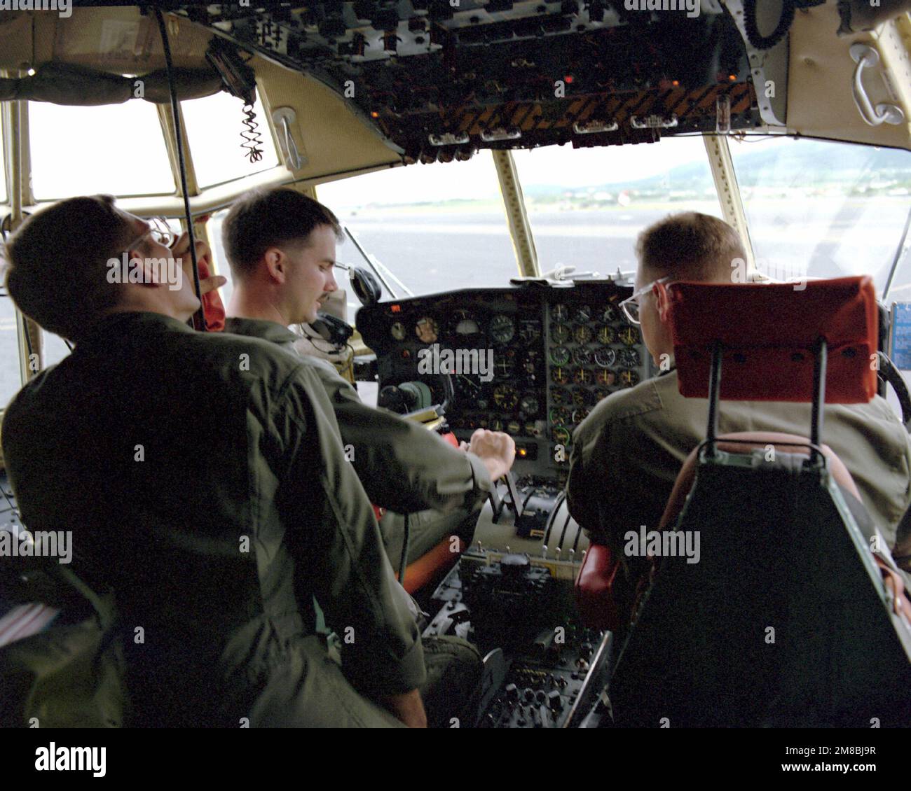 The cockpit crew of a Marine Refueler-Transport Squadron 253 (VMGRT-253 ...