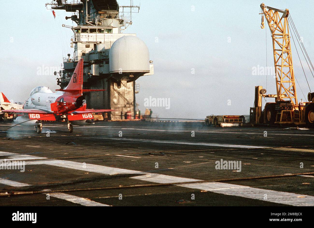 A TA-4J Skyhawk aircraft from Training Wing 2 (TW-2) catches an ...