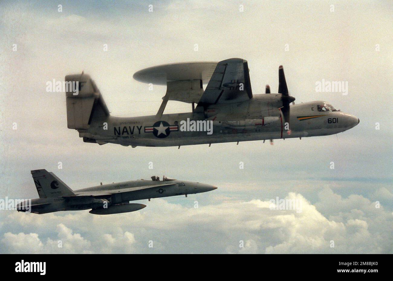 An air-to-air right side view of an E-2C Hawkeye aircraft from Carrier ...
