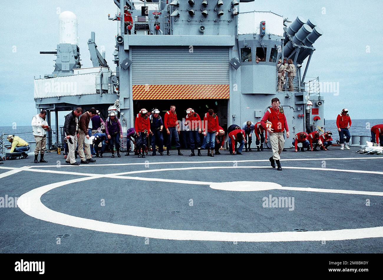 Members of the aviation fuels crew join crash and salvage personnel and ...