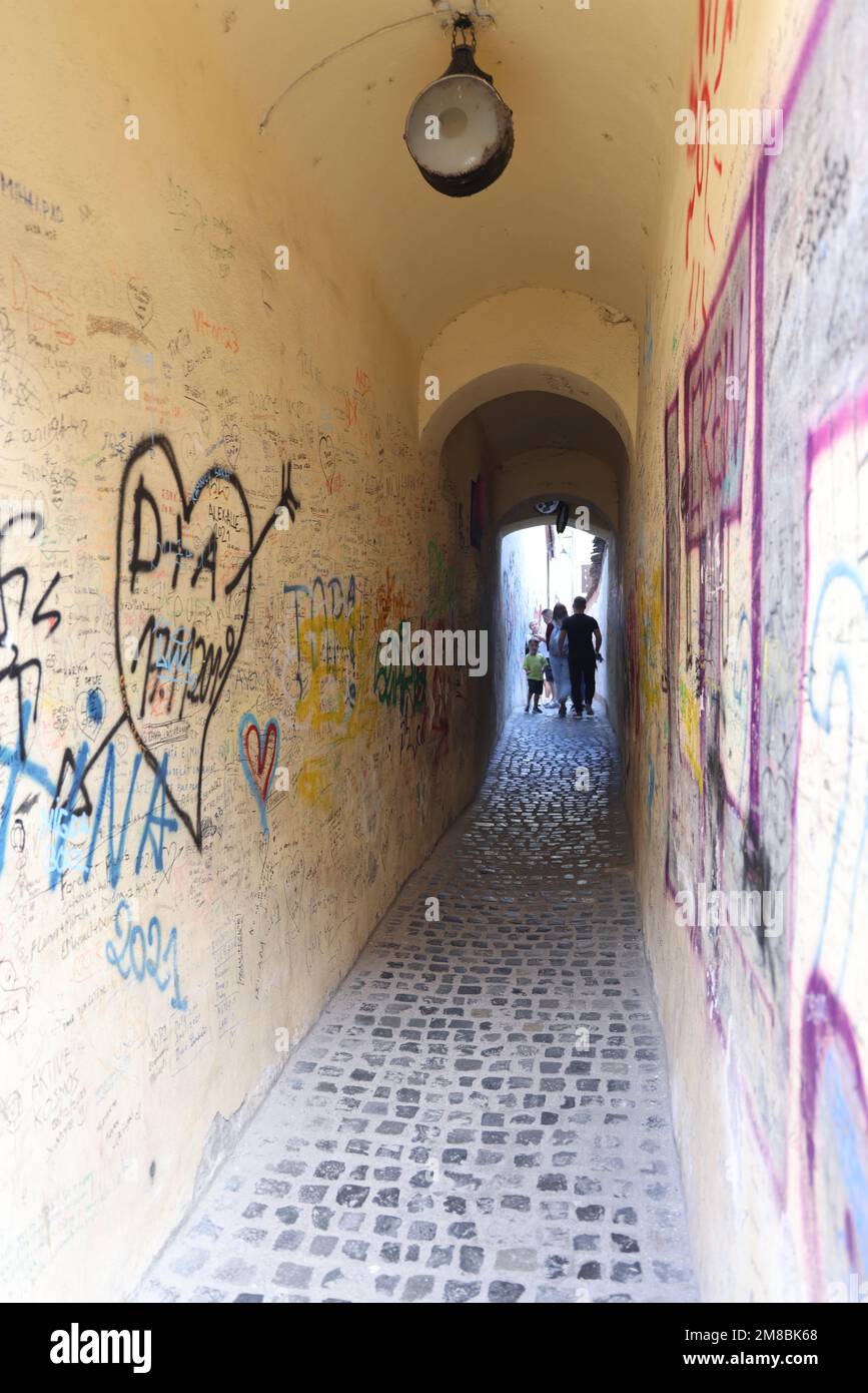 View into Strada Sforii (Rope Street). the narrowest street of Brașov ...