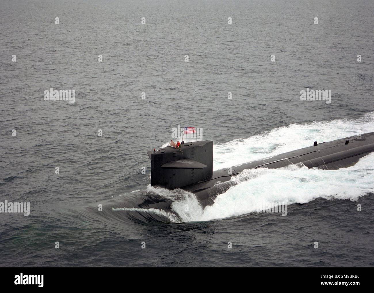 A port bow view of the nuclear-powered attack submarine USS HADDOCK ...