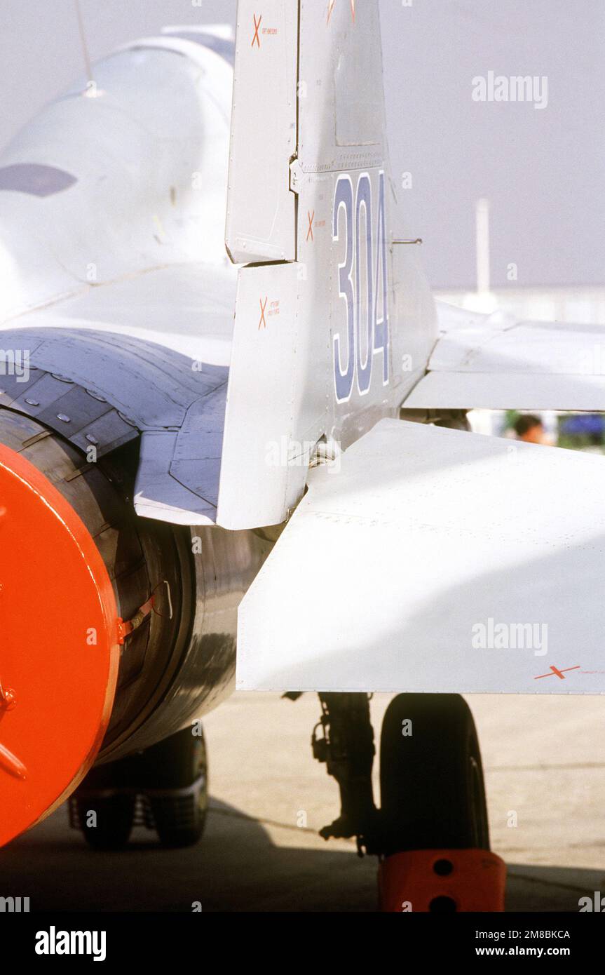 A partial rear view of a Soviet MiG-29UB Fulcrum aircraft on display at ...