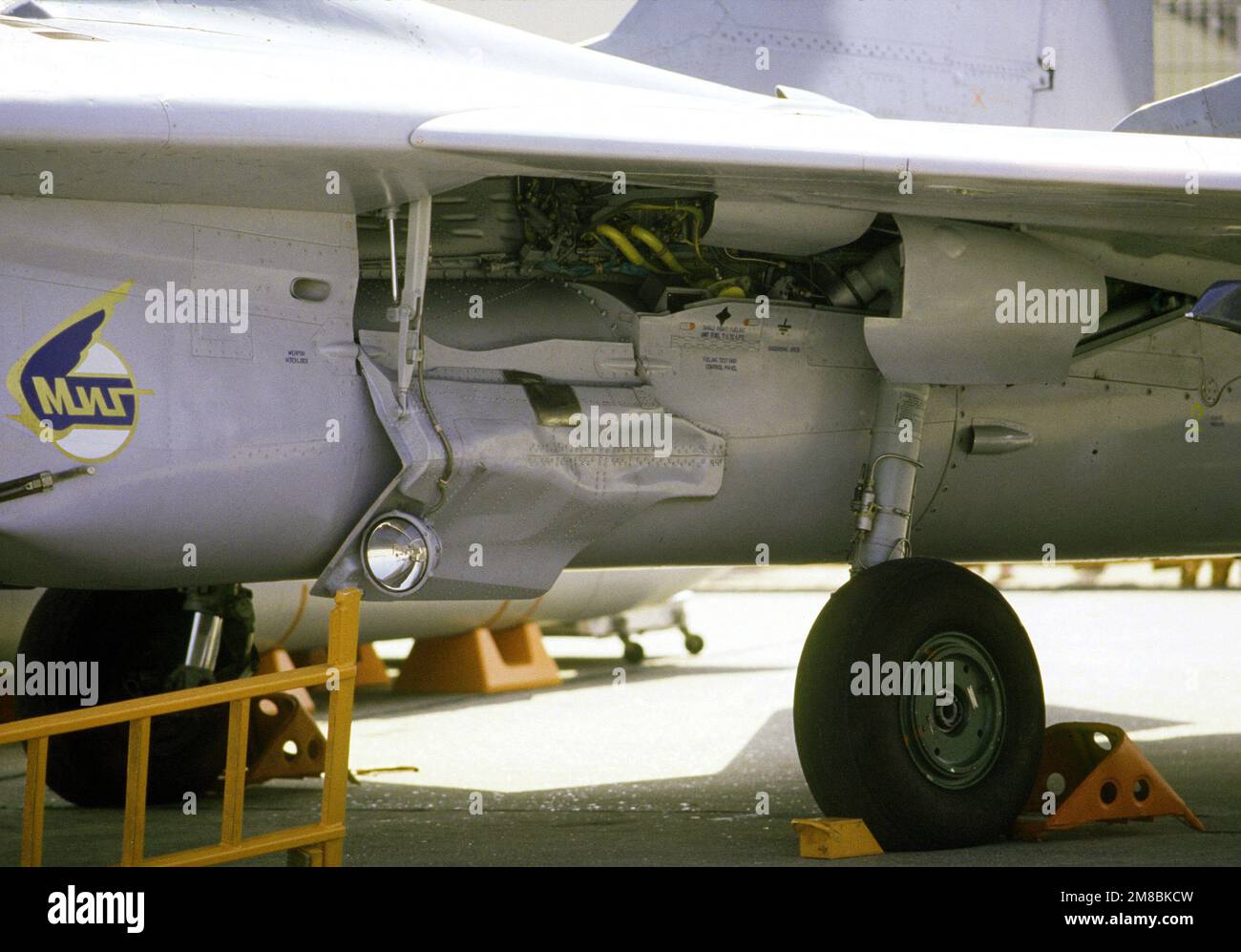 A panel beneath the wing root stands open on a Soviet MiG-29UB Fulcrum ...