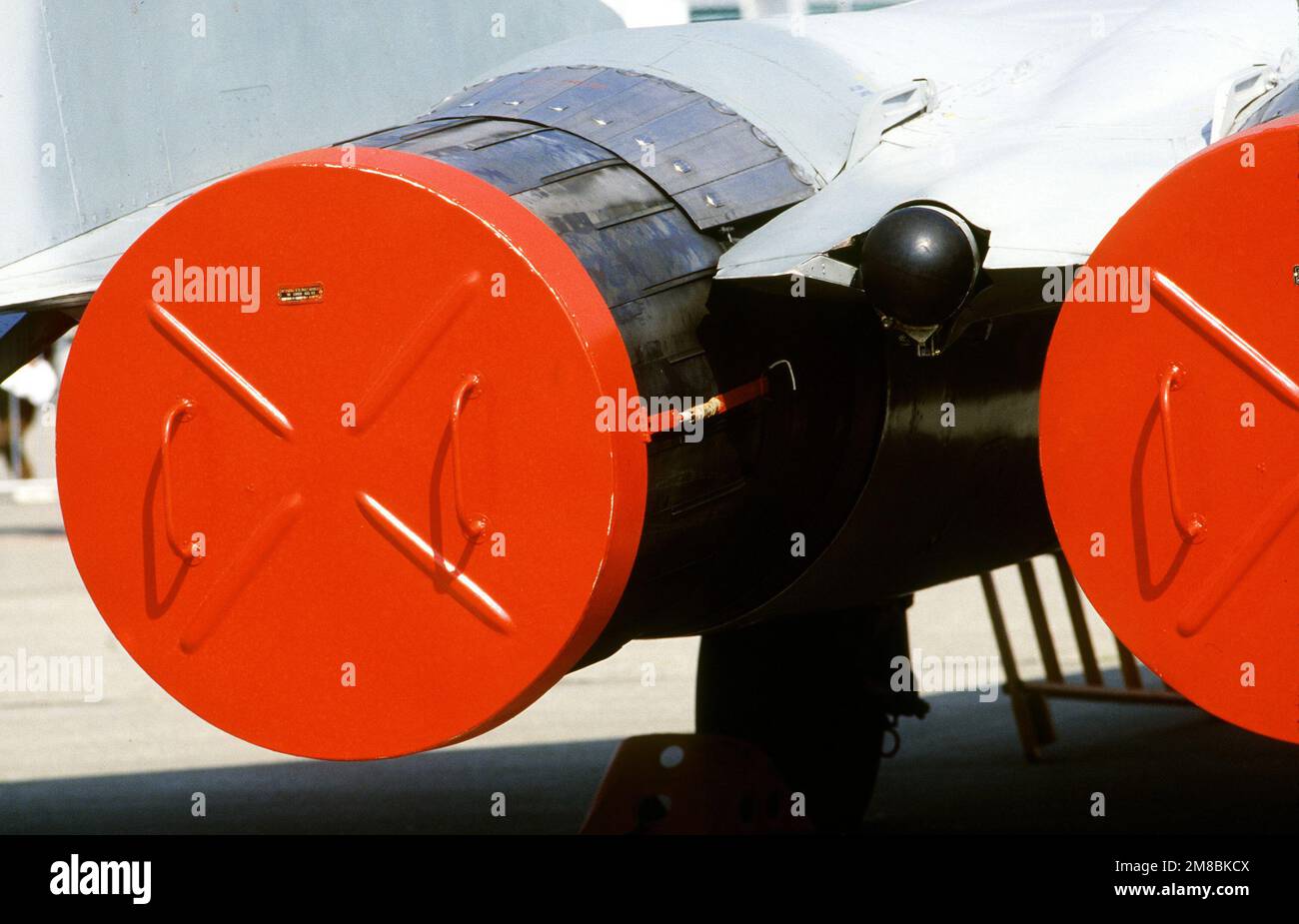 A partial rear view of a Soviet MiG-29UB Fulcrum aircraft on display at ...