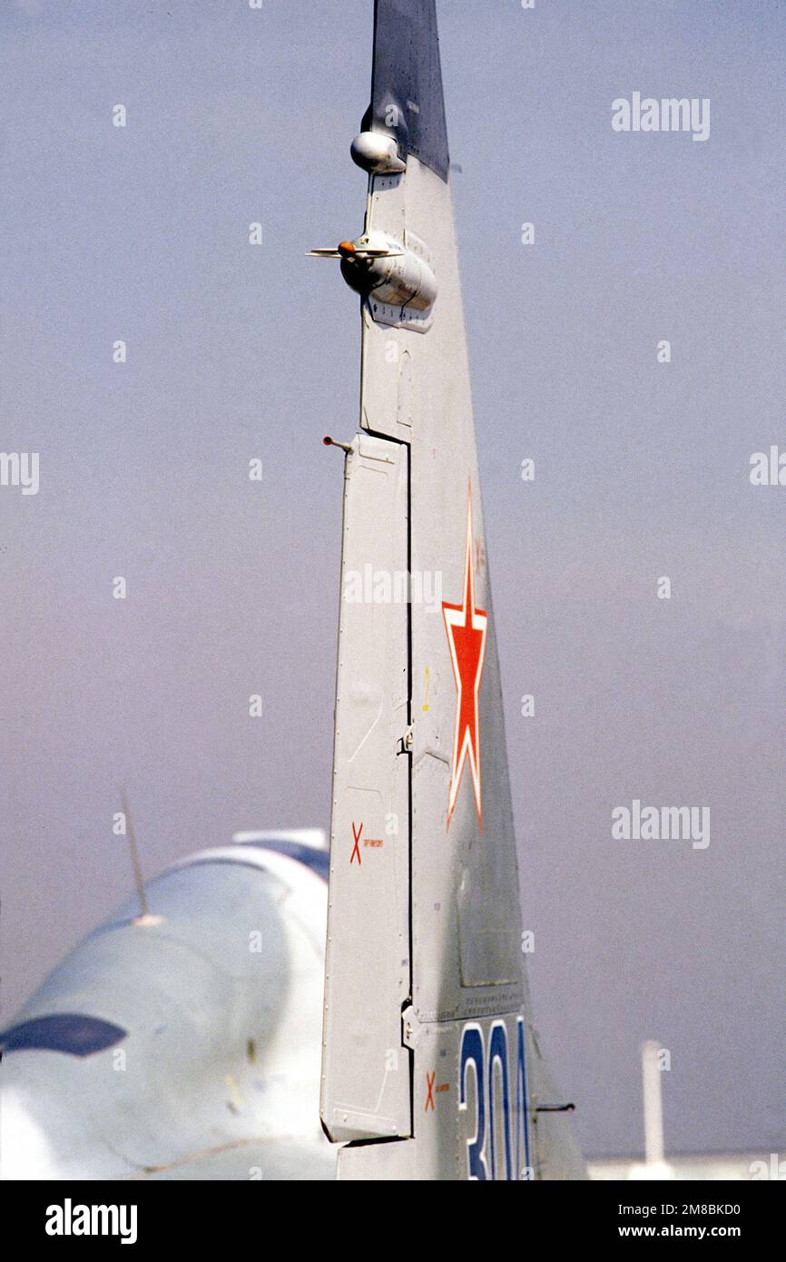 A close-up view of a vertical stabilizer on a Soviet MiG-29UB Fulcrum ...