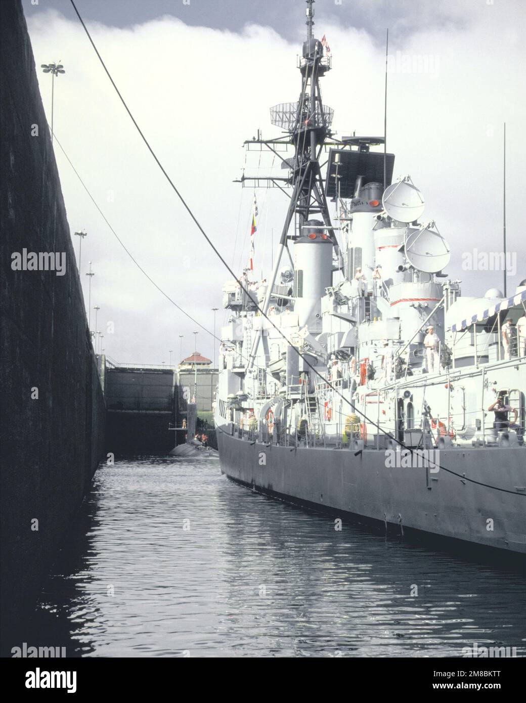 The nuclear-powered attack submarine USS SKIPJACK (SSN-585) waits ahead ...