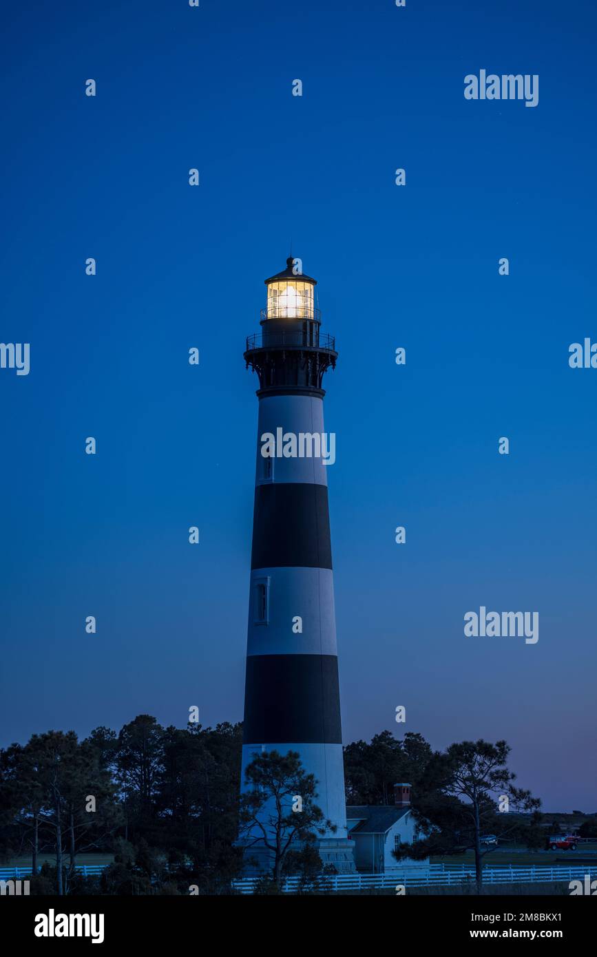 Bodie Island Lighthouse under stars and waxing gibbous moon in Cape ...