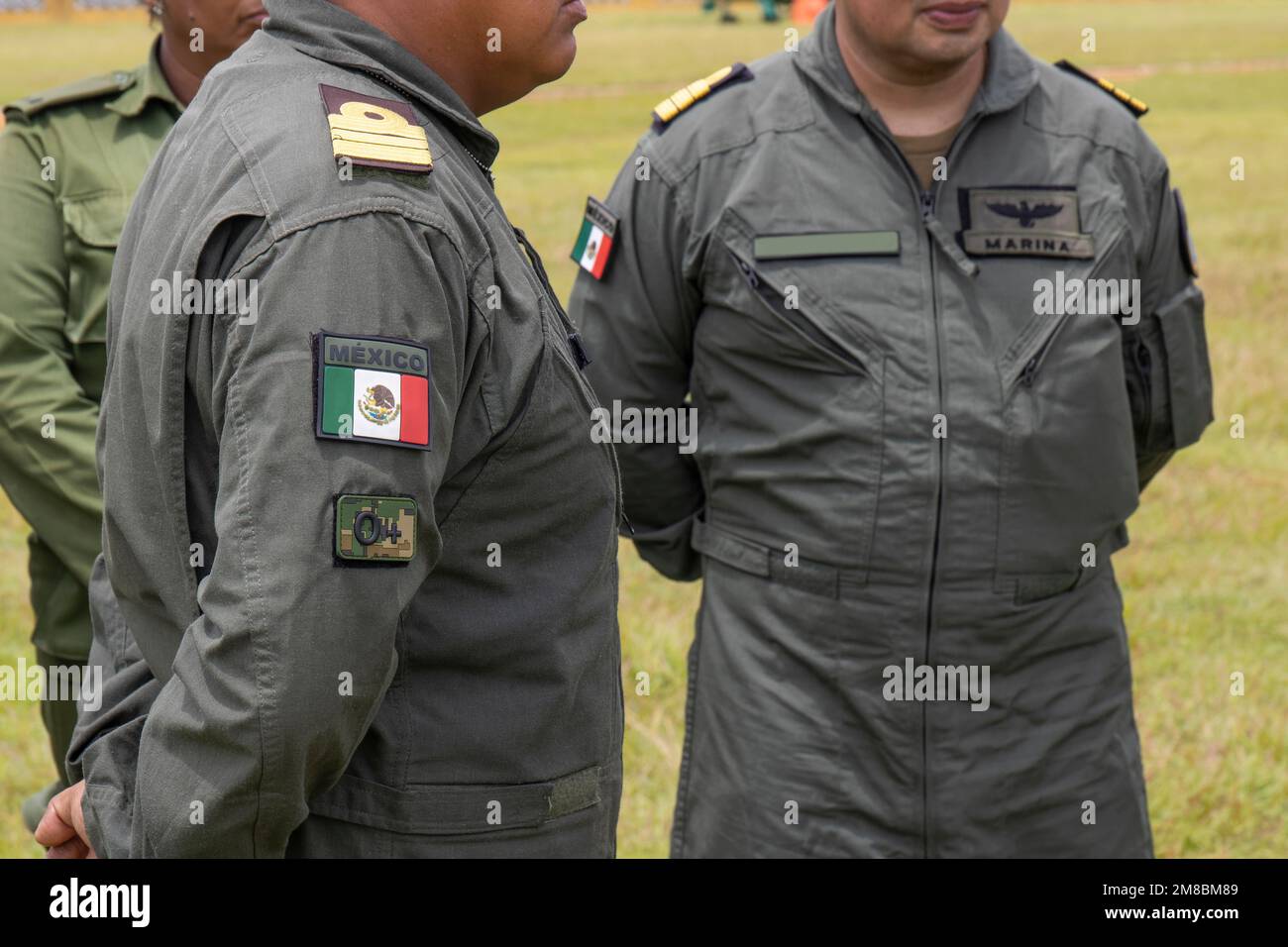 Two people in military suits, armed forces of Mexico in a meeting ...