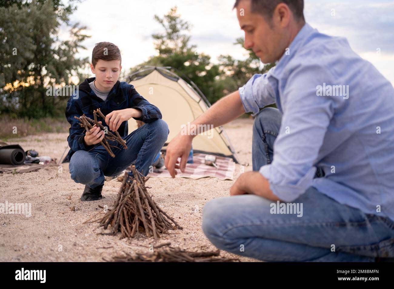Father and son spending happy leisure time together outdoors in the ...