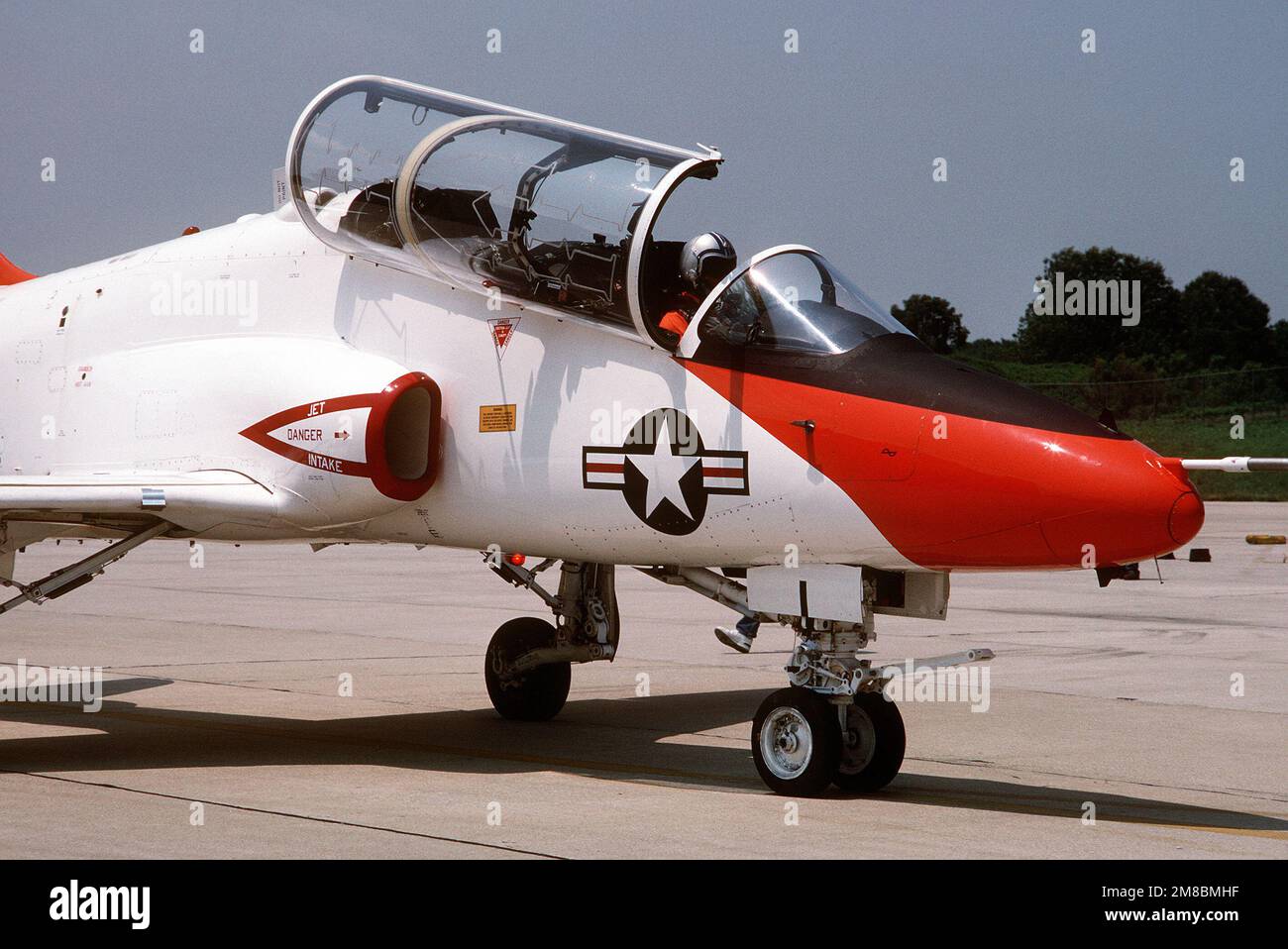 The pilot of a T-45A Goshawk taxis the aircraft along the flight line ...