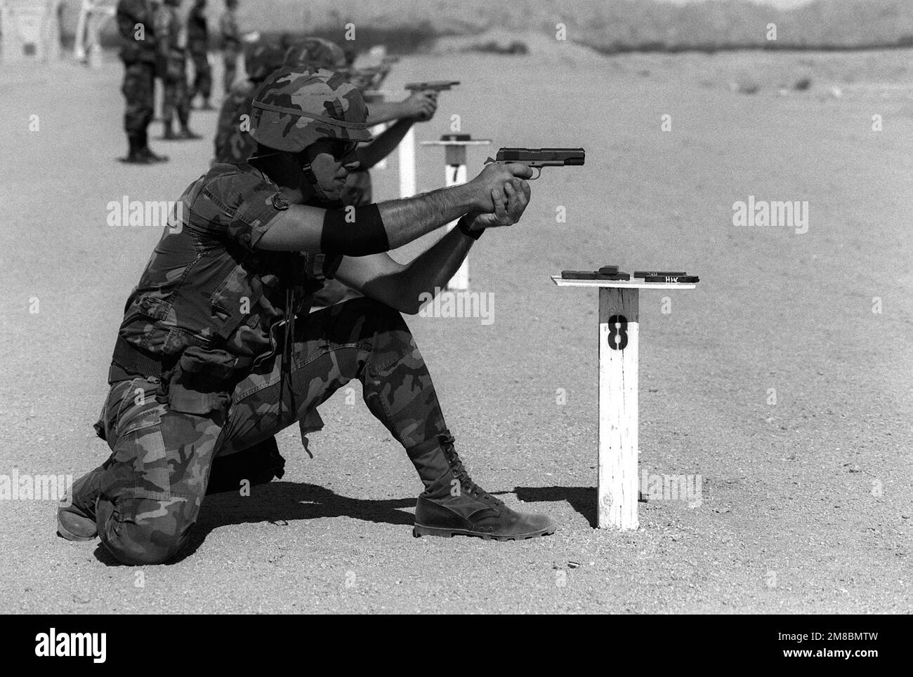 Soldiers from the 177th Support Battalion (Forward) fire M-1911A1 .45 ...