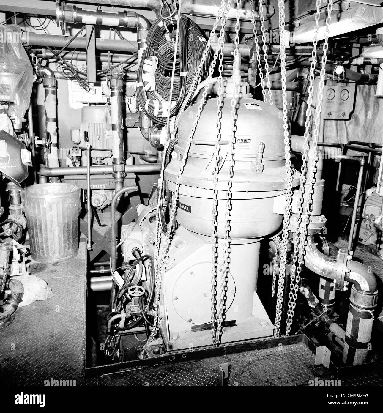 A view of the auxiliary engine room No. 2 aboard the guided missile ...