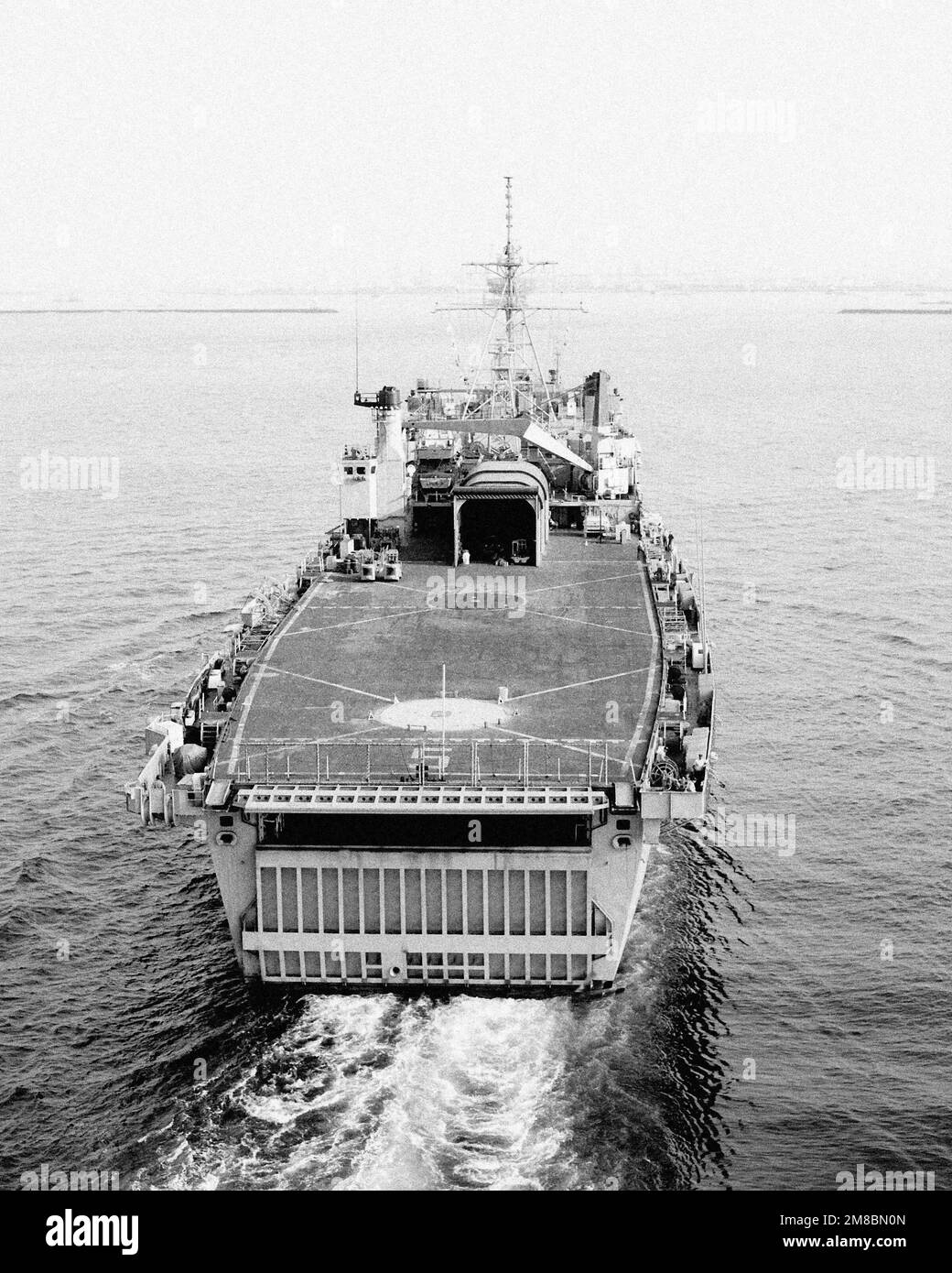 A stern view of the amphibious transport dock USS OGDEN (LPD 5 ...