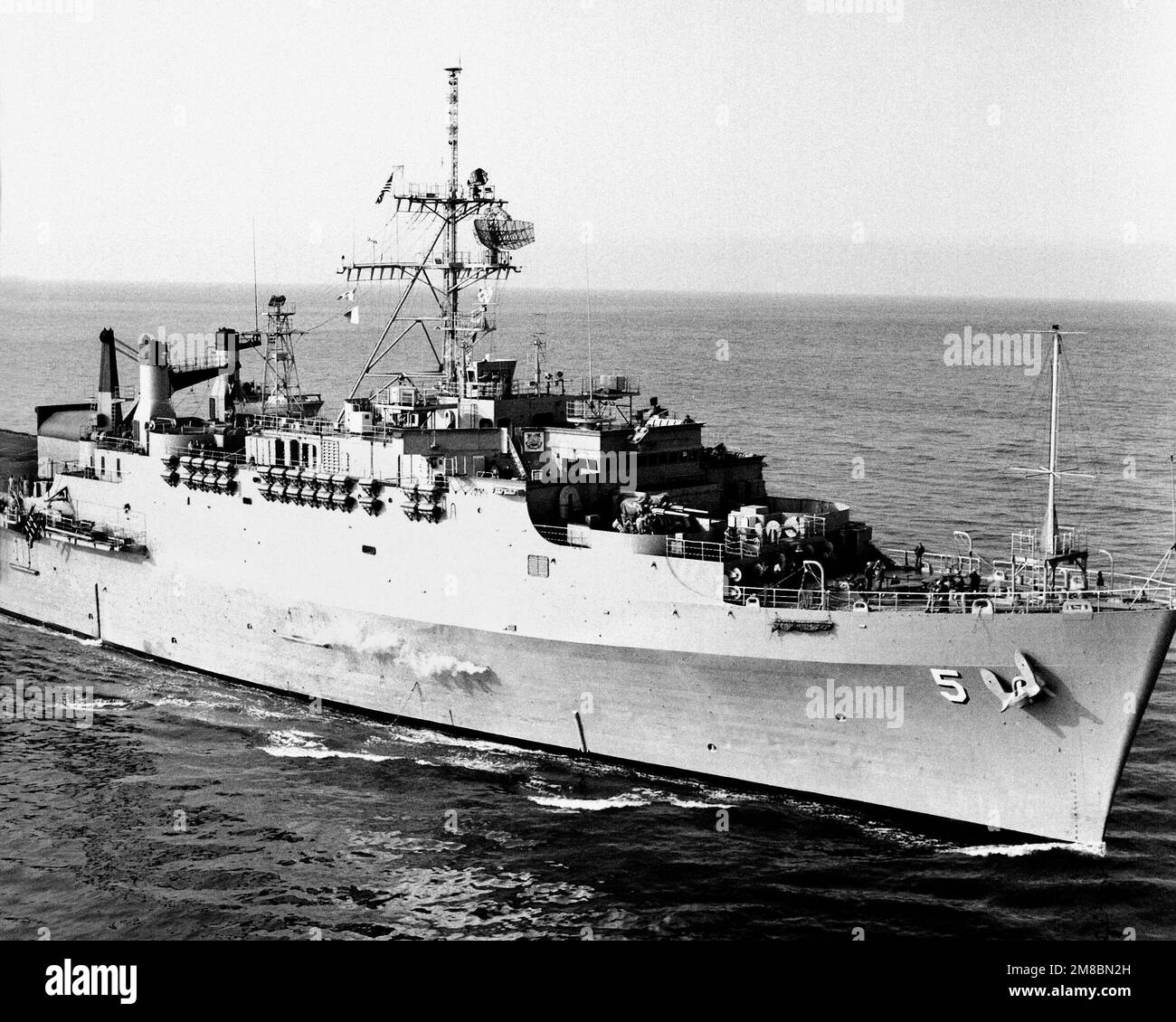 A partial starboard bow view of the amphibious transport dock USS OGDEN ...