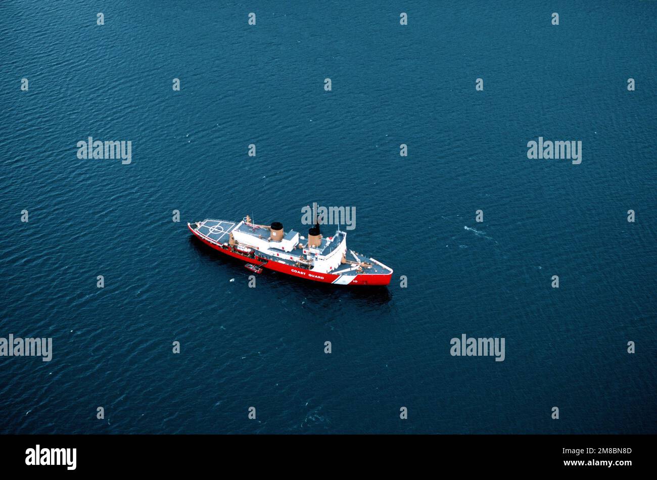 An aerial view of the icebreaker USCGC POLAR STAR (WAGB-10) at anchor ...