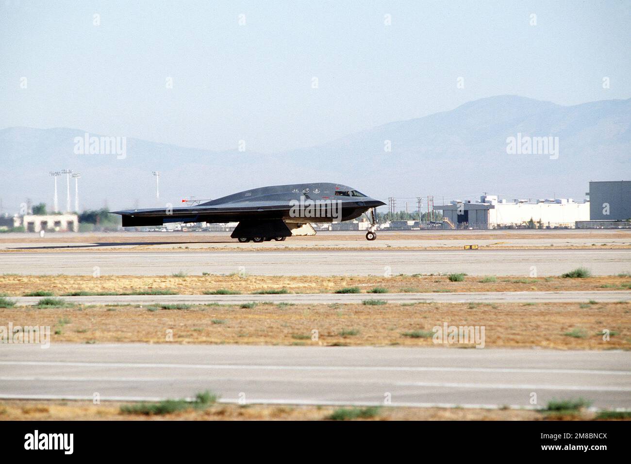 A right side view of a B-2 advanced technology bomber aircraft on the ...