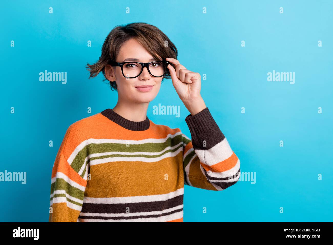 Photo of confident cool woman dressed striped pullover hand eyewear ...