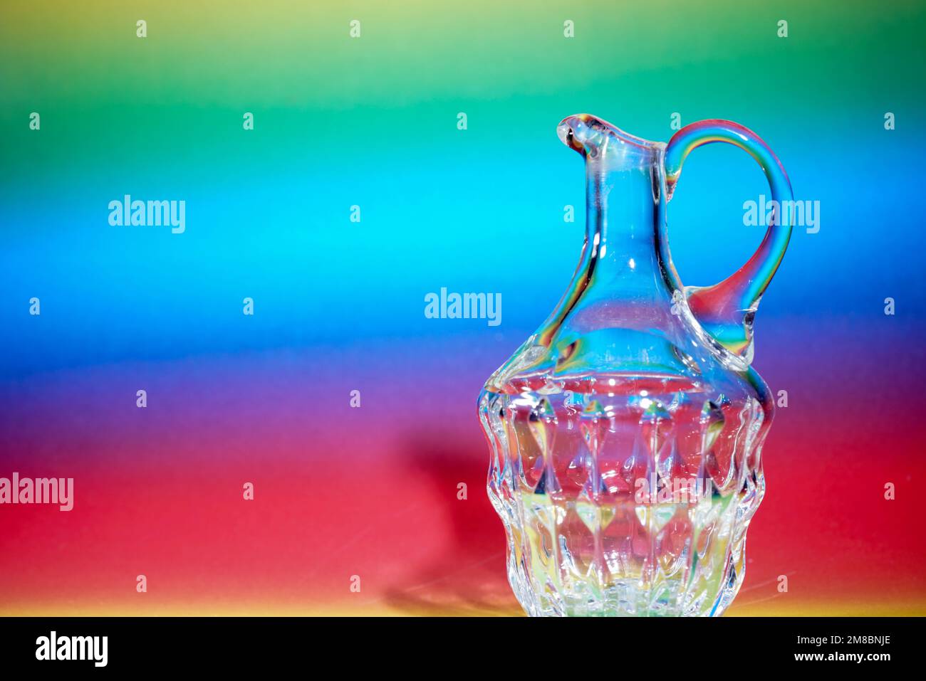 Chess with game pieces made of glass, queen, king, pawn and game board ...