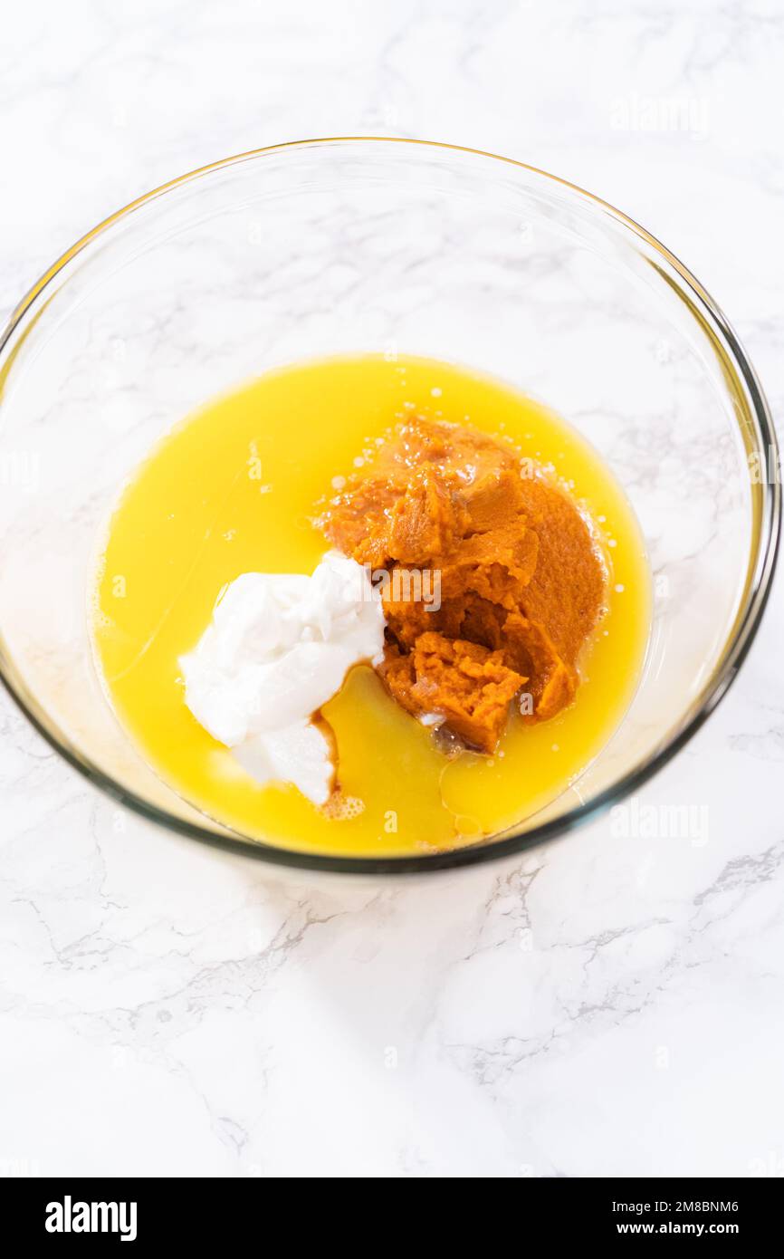 Chocolate pumpkin bundt cake with toffee glaze Stock Photo - Alamy