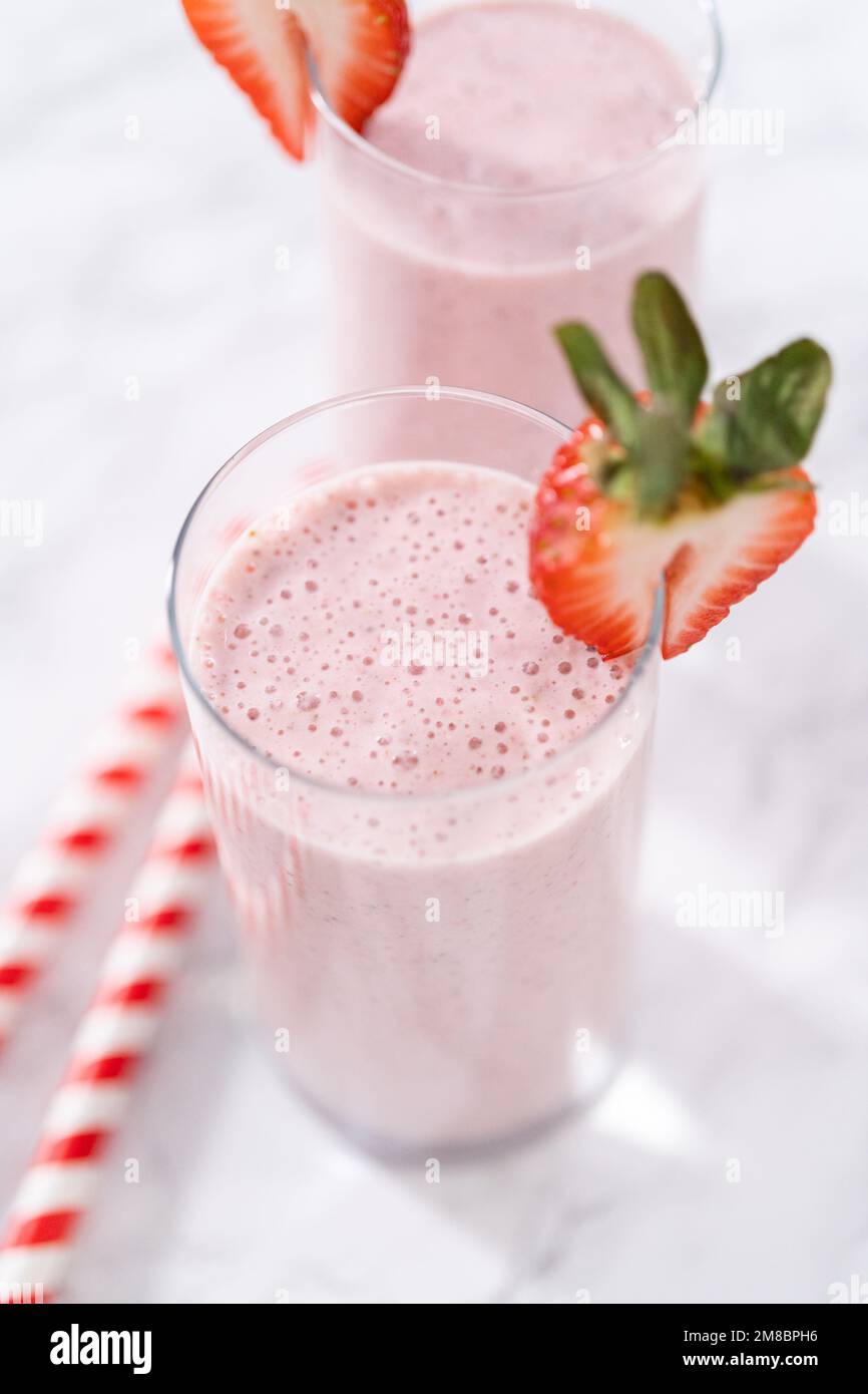Strawberry banana smoothie Stock Photo - Alamy