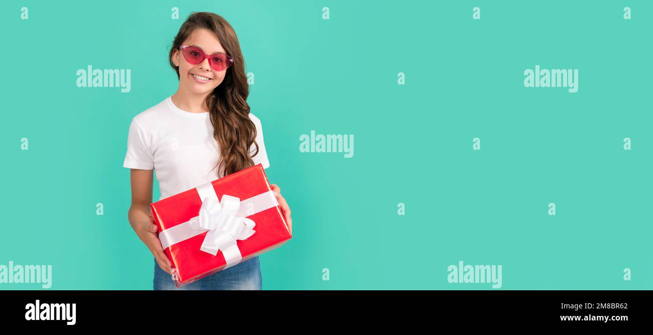 surprise for her. boxing day. cheerful kid with present box. teen girl ...