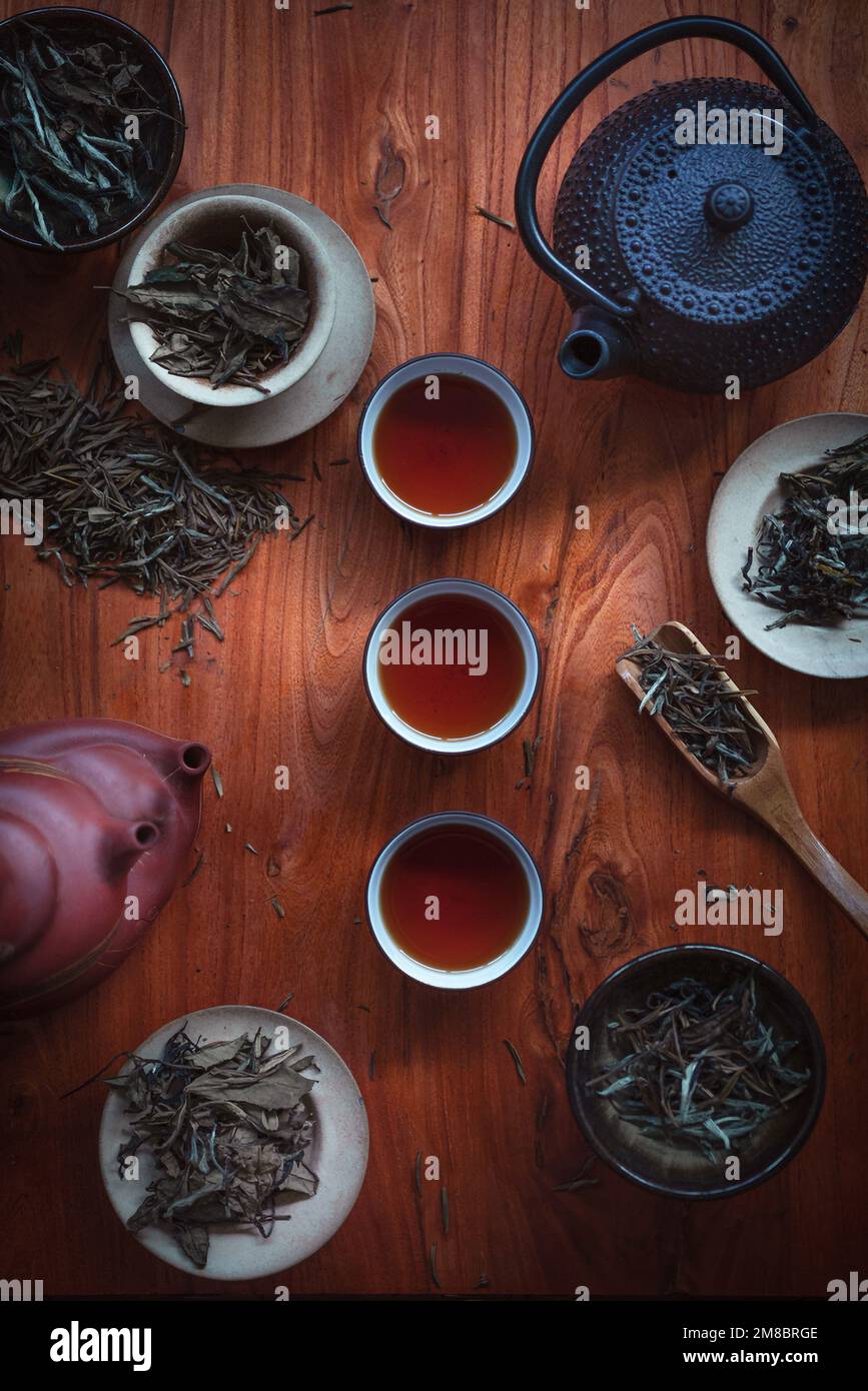 A vertical shot of a table of herbal teas Stock Photo - Alamy