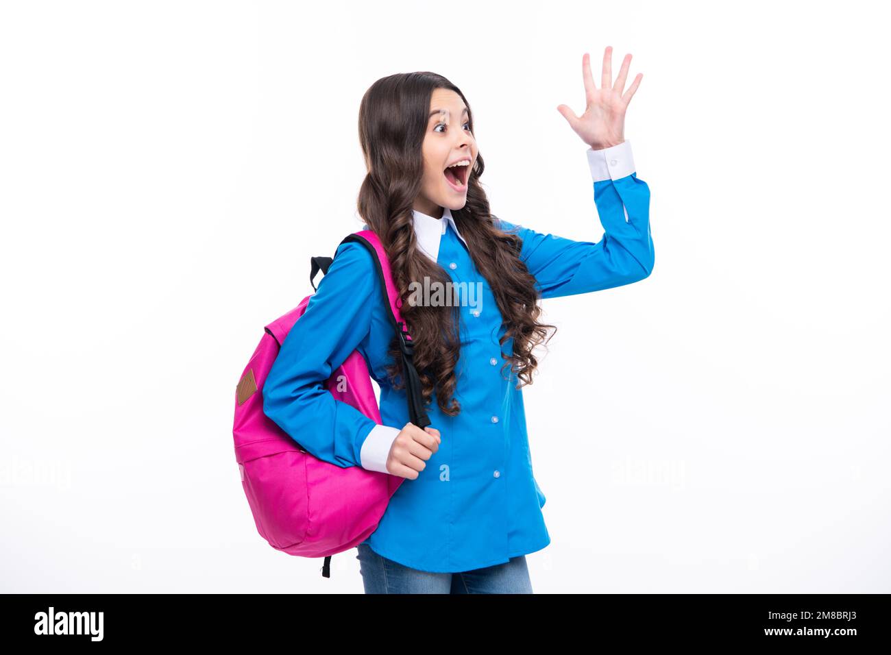 Excited face. Schoolgirl in school uniform with backpack. Teenage girl ...