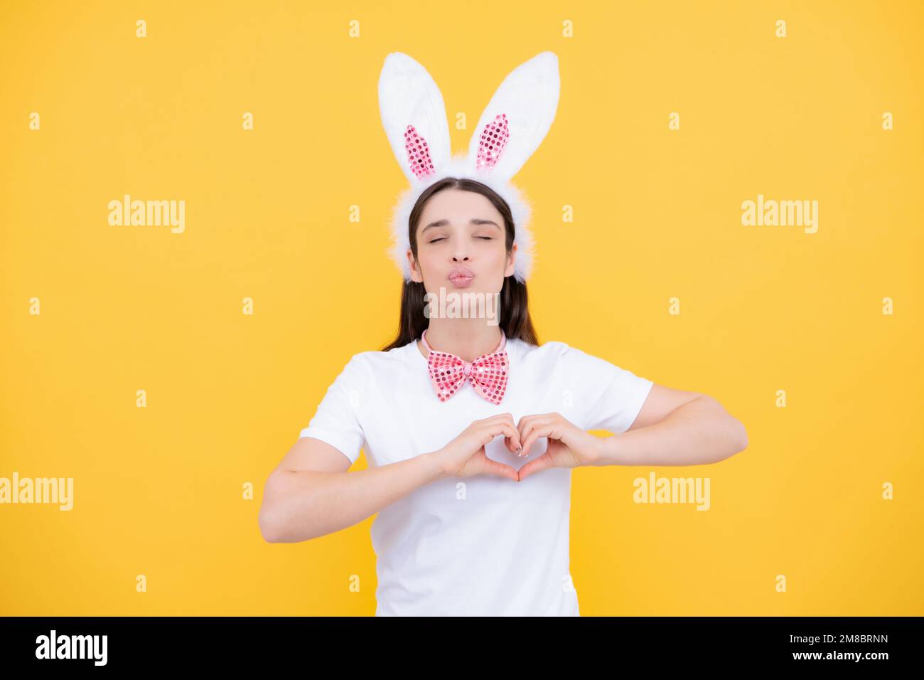 Happy Easter Portrait Of Young Smiling Woman With Bunny Ears Isolated