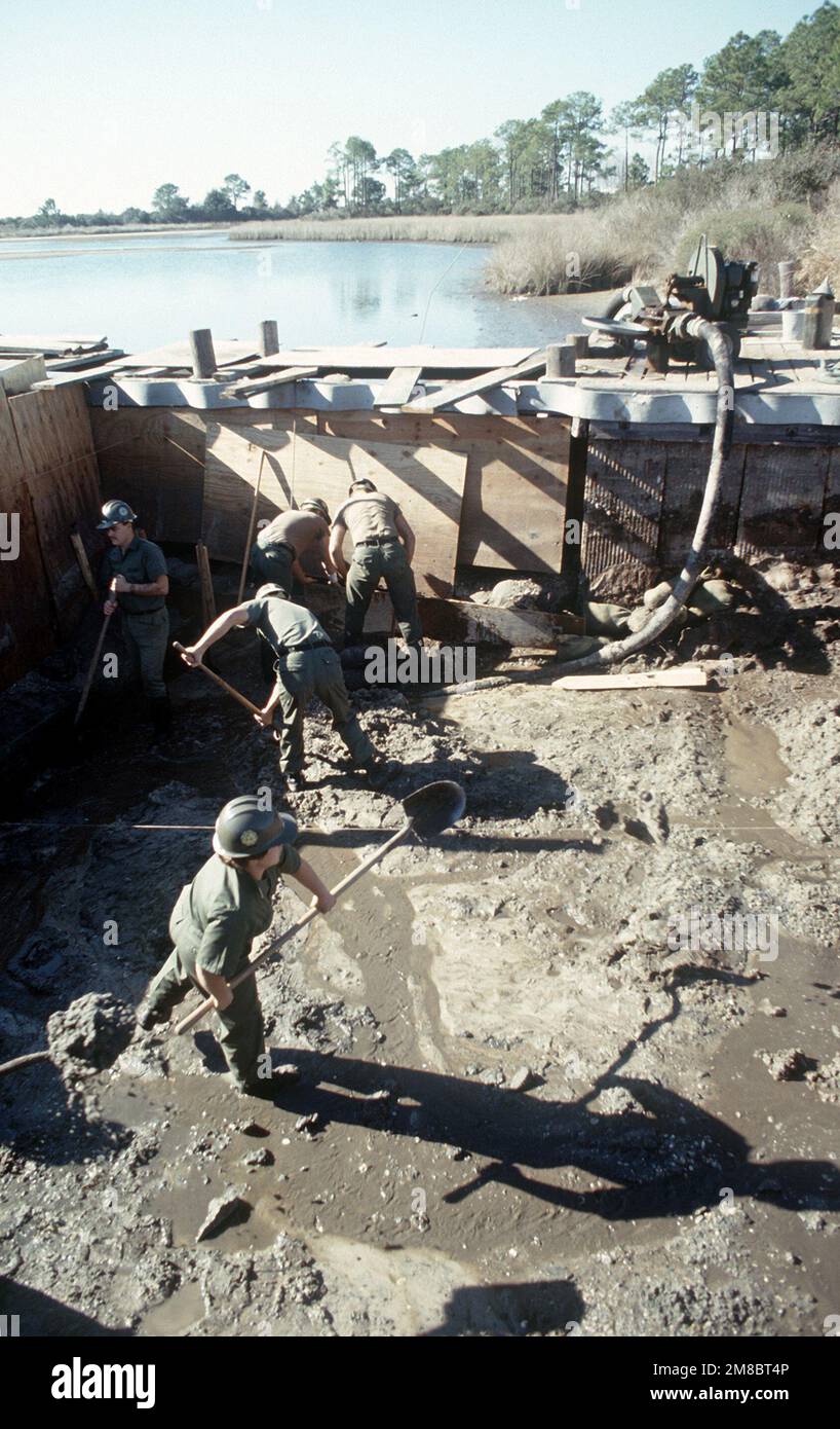 Seabees of Construction Battalion Unit 402 (CBU 402) prepare ground for ...