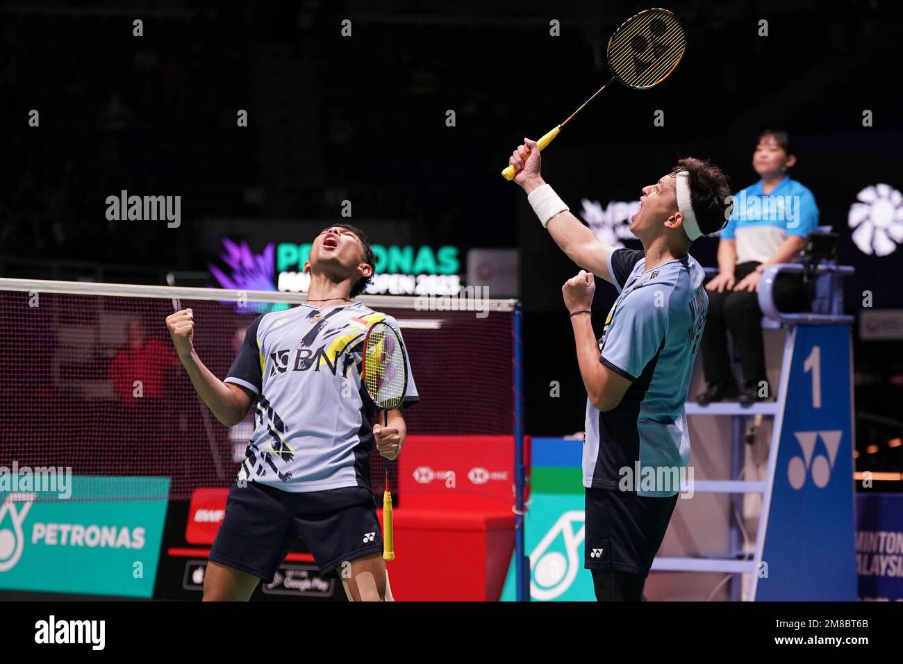 Indonesia's Fajar Alfian, left and Muhammad Rian Ardianto reacts during ...