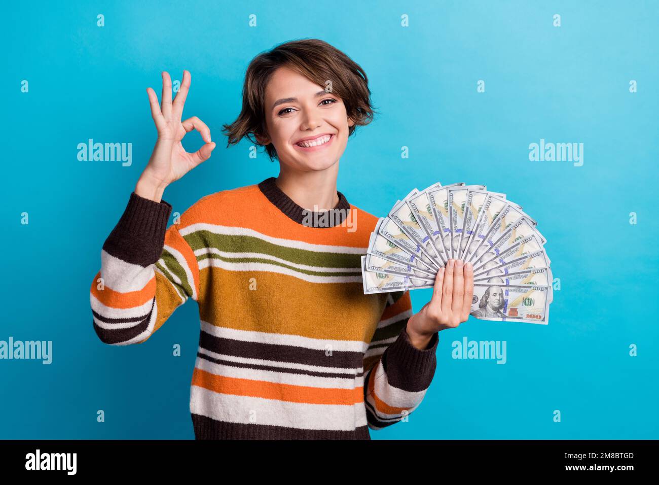 Photo of funny confident woman dressed striped pullover showing okey ...