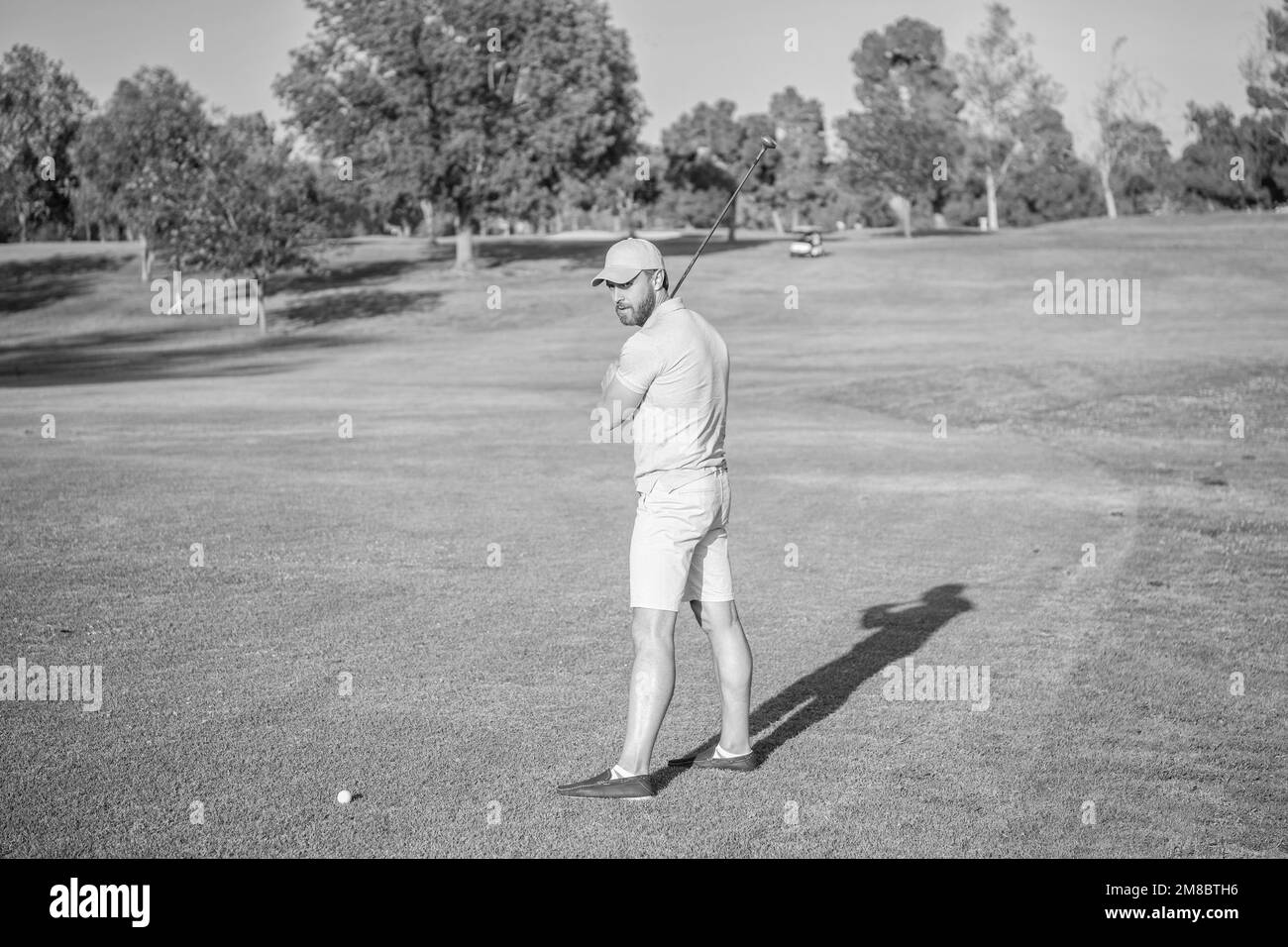 golfer in cap with golf club. people lifestyle. man playing game on ...