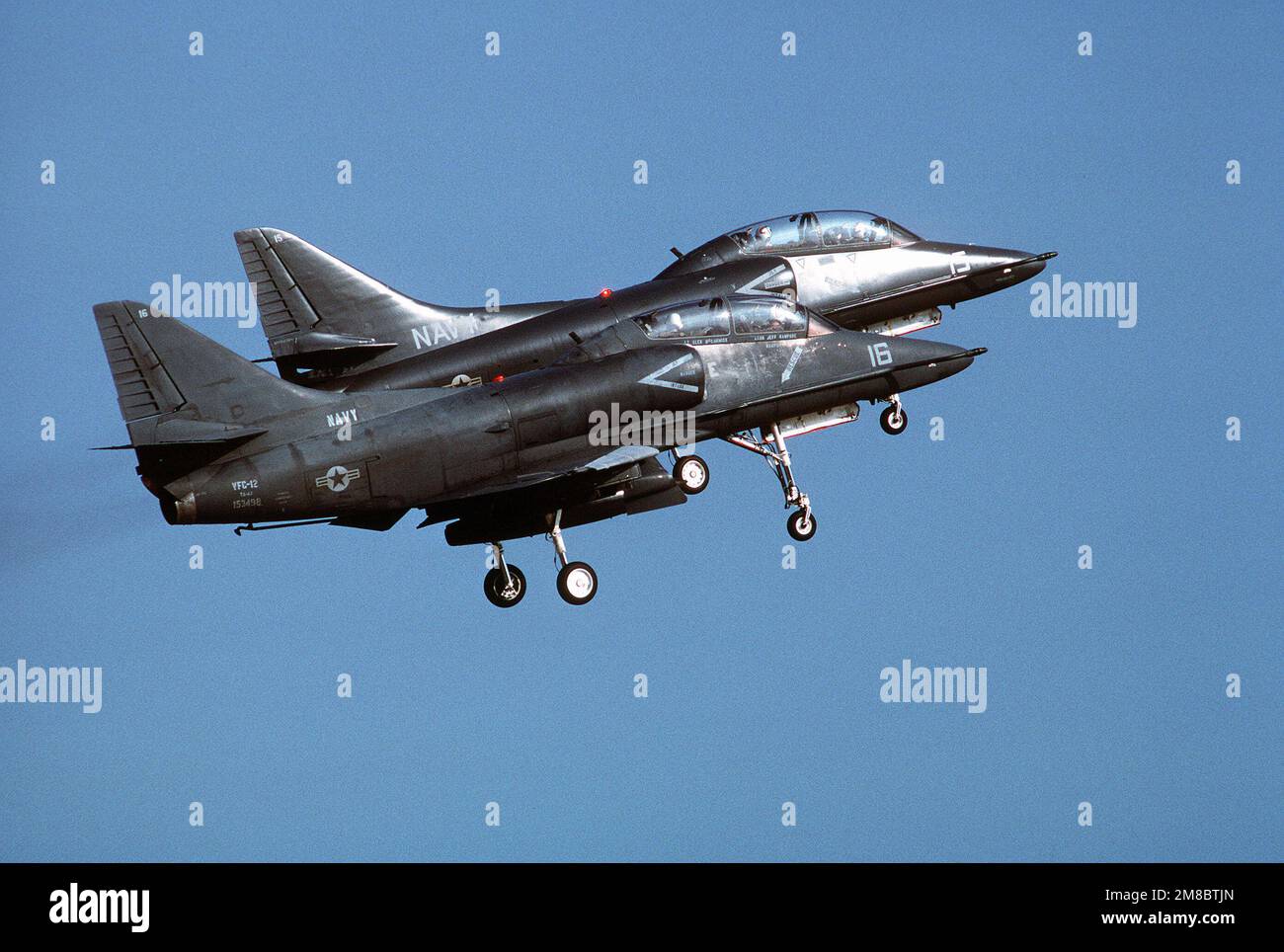 Two TA-4J Skyhawk aircraft from Composite Fighter Squadron 12 (VFC-12 ...