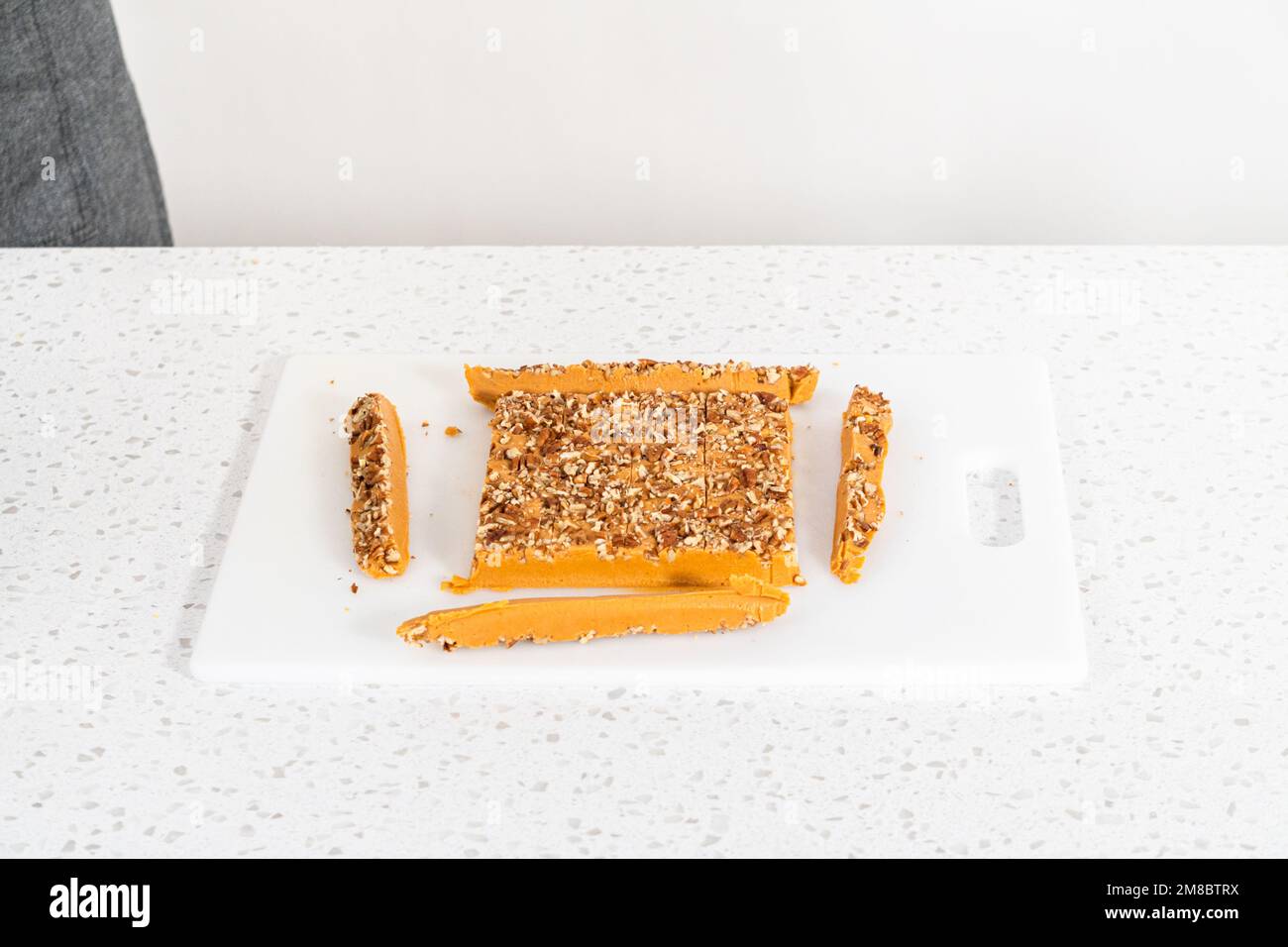 Pumpkin spice fudge with pecans Stock Photo - Alamy