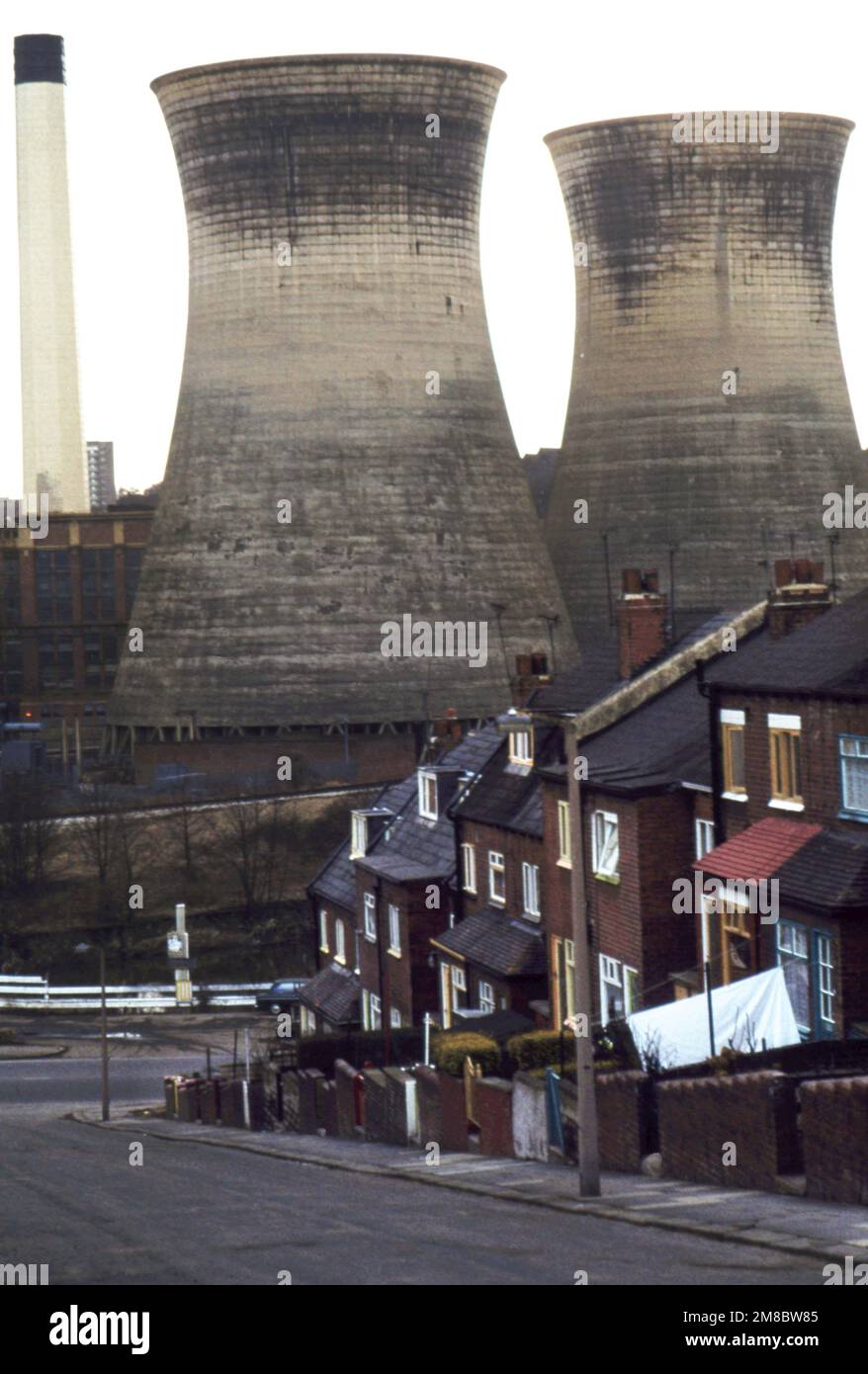 Electricity Power Station Cooling Towers at the end of a street of ...