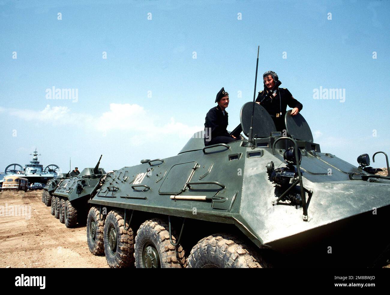 Soviet naval infantrymen (marines) man a line of BTR-60PB amphibious ...