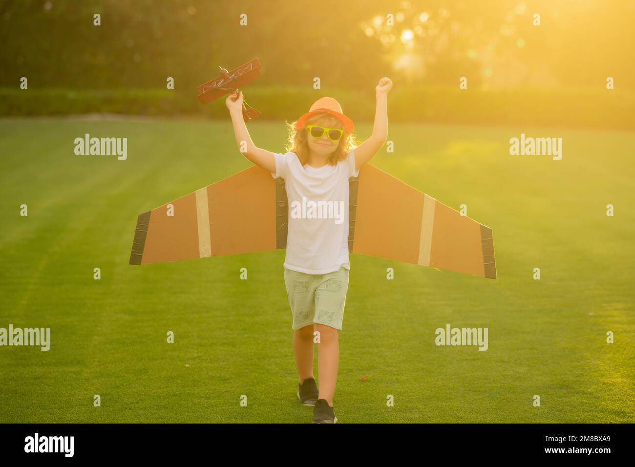 Child playing. Happy boy play in airplane outdoors. Concept of dreams ...