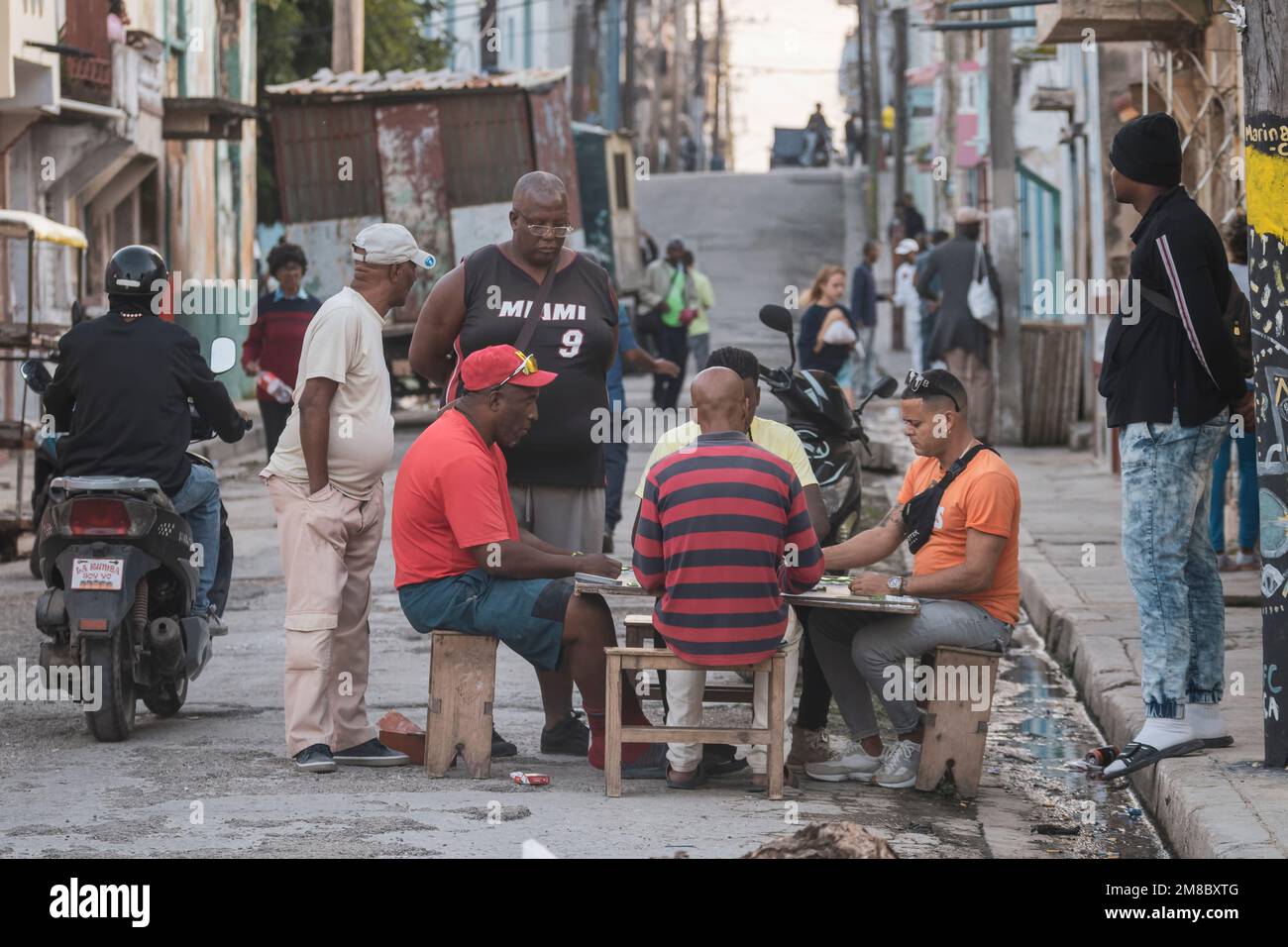 Some black Latinos playing dominoes in the neighborhood of La Marina ...