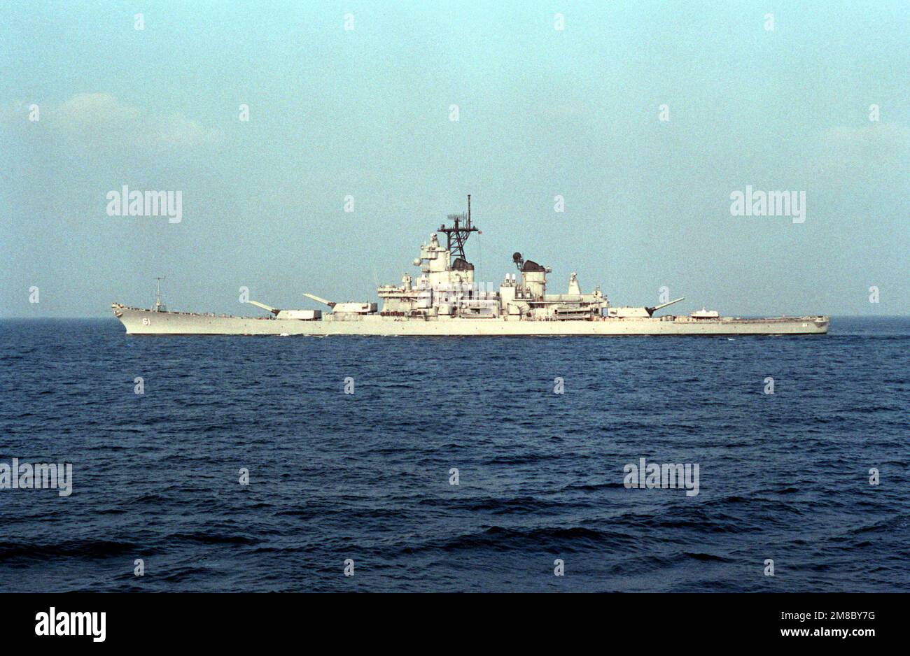 A port beam view of the battleship USS IOWA (BB 61) underway off the coast of Lebanon. Country ...
